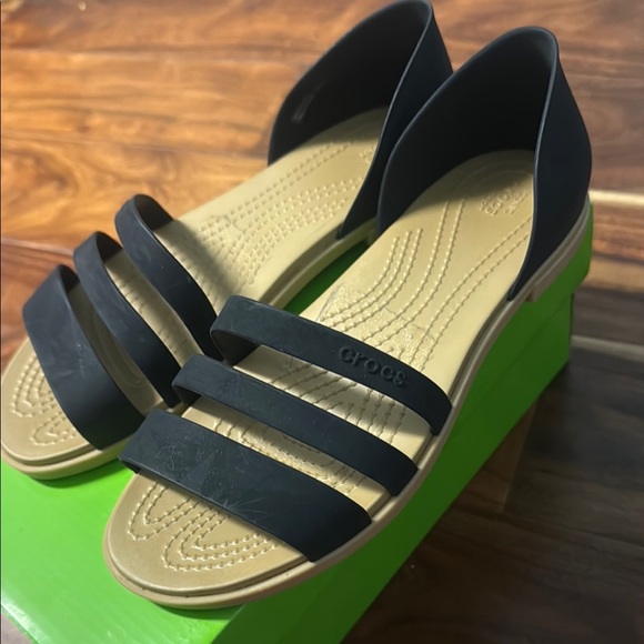 CROCS | Shoes | Crocs Black And Tan Sandals With Minimalist Design ...